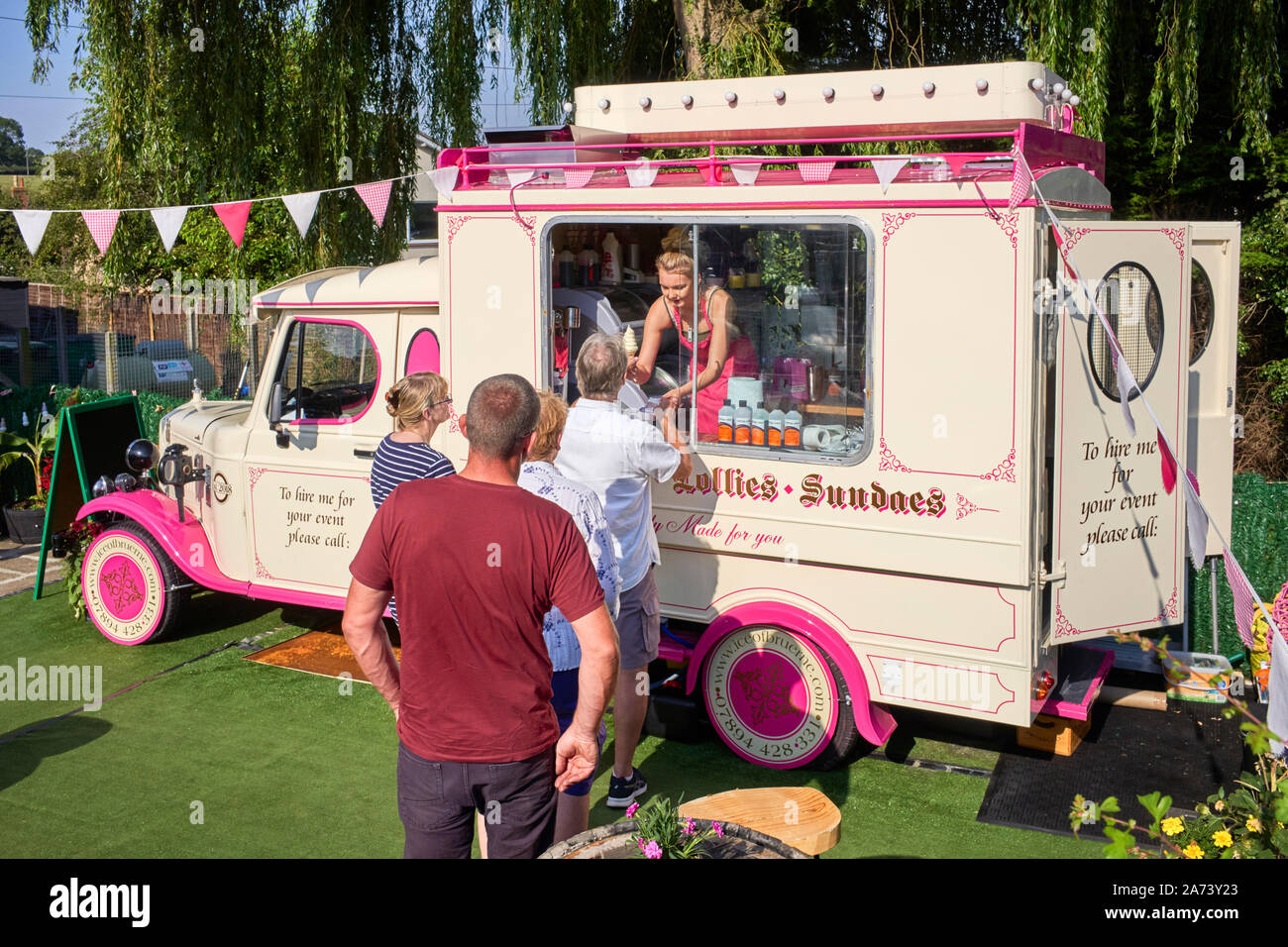 Ice cream van serving hi-res stock photography and images - Alamy