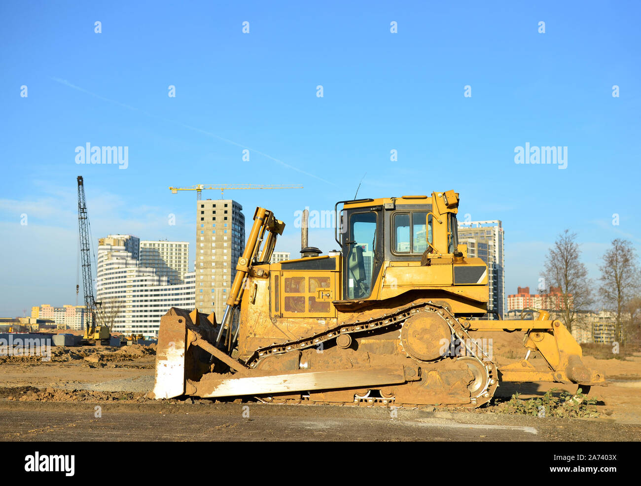 Track-type bulldozer, earth-moving equipment. Land clearing, grading ...