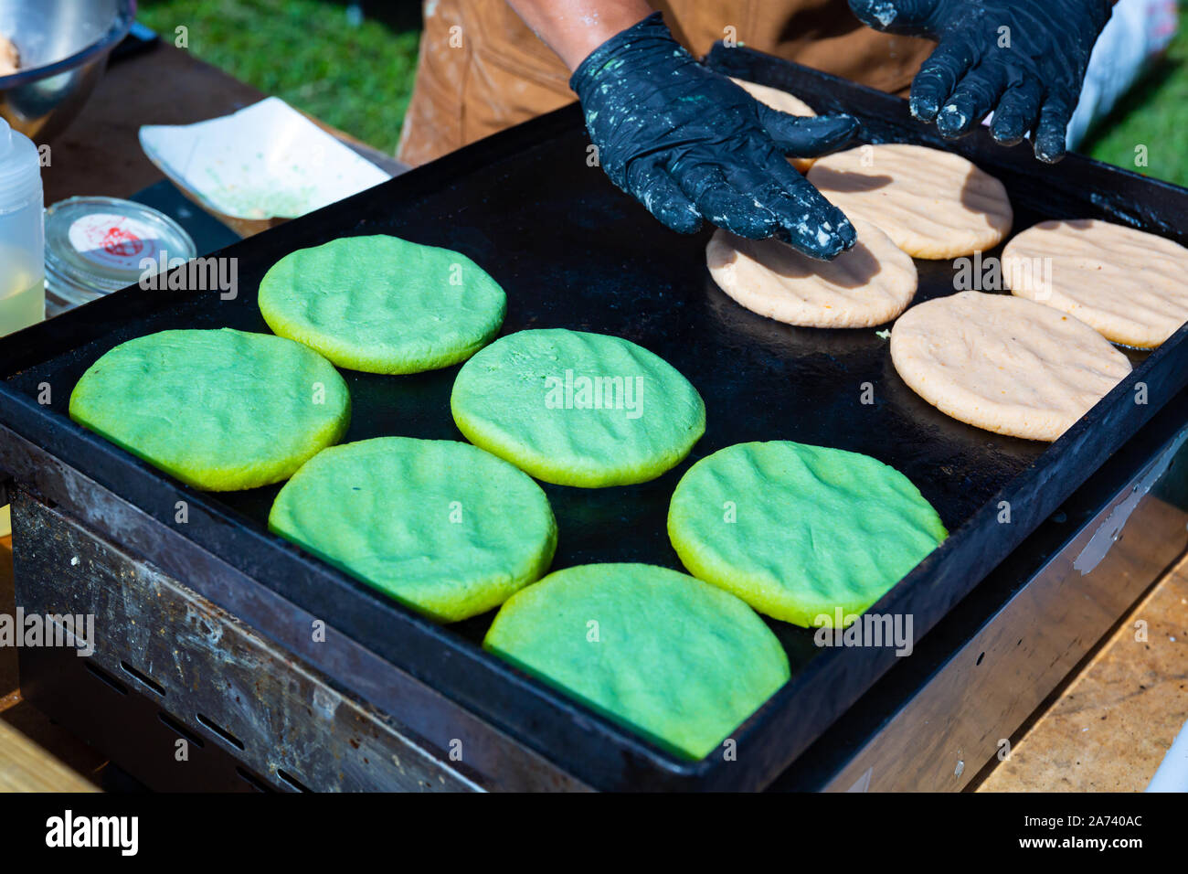 Arepas from corn meal, Venezuelan traditional fast street food, nobody ...