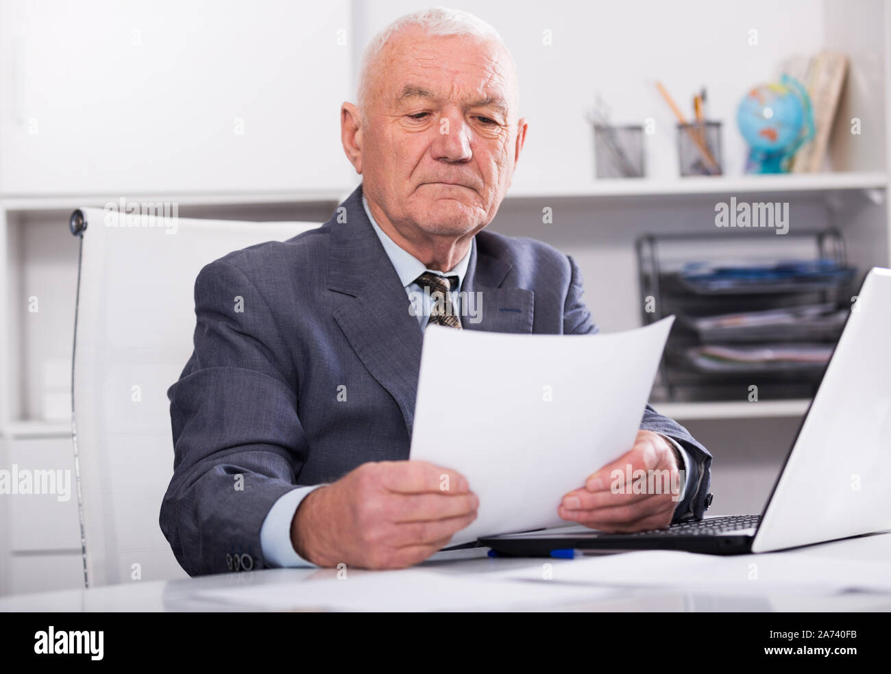 Productive senior employee working hi-res stock photography and images ...