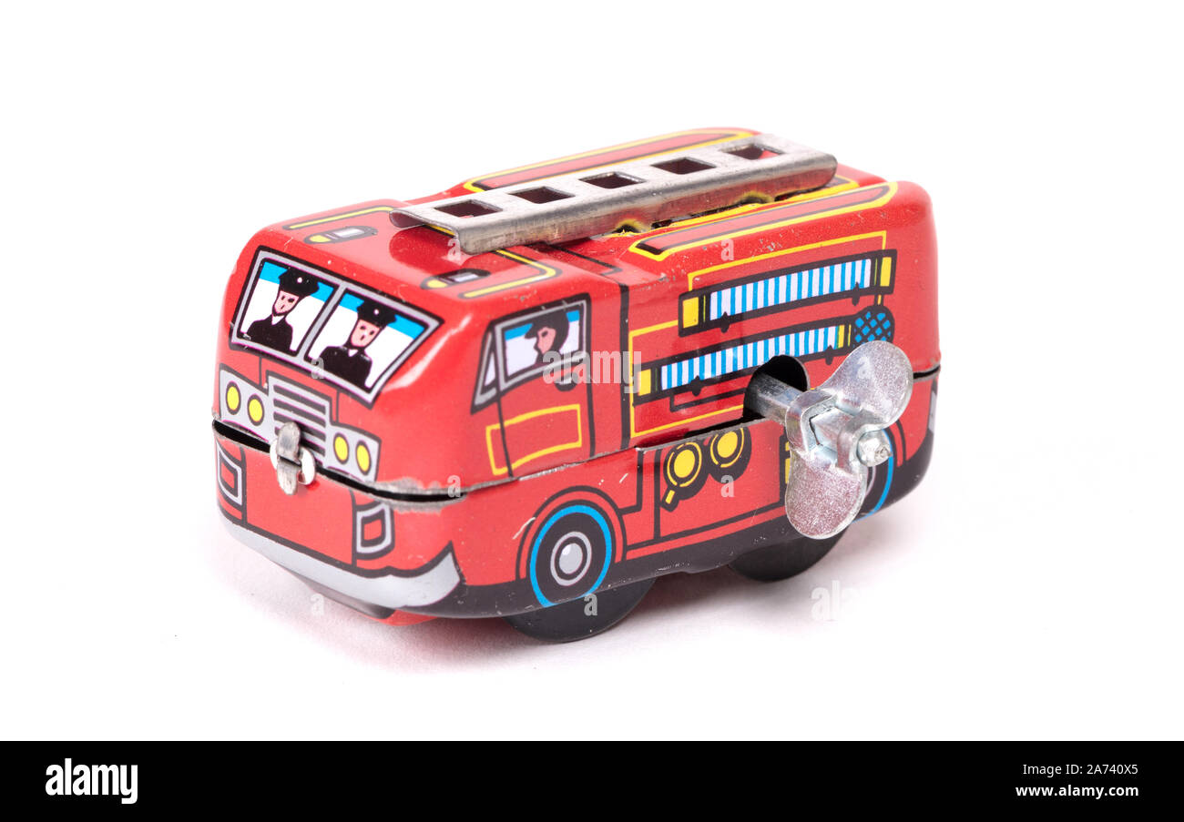 Vintage red wind-up toy car, isolated on white Stock Photo - Alamy