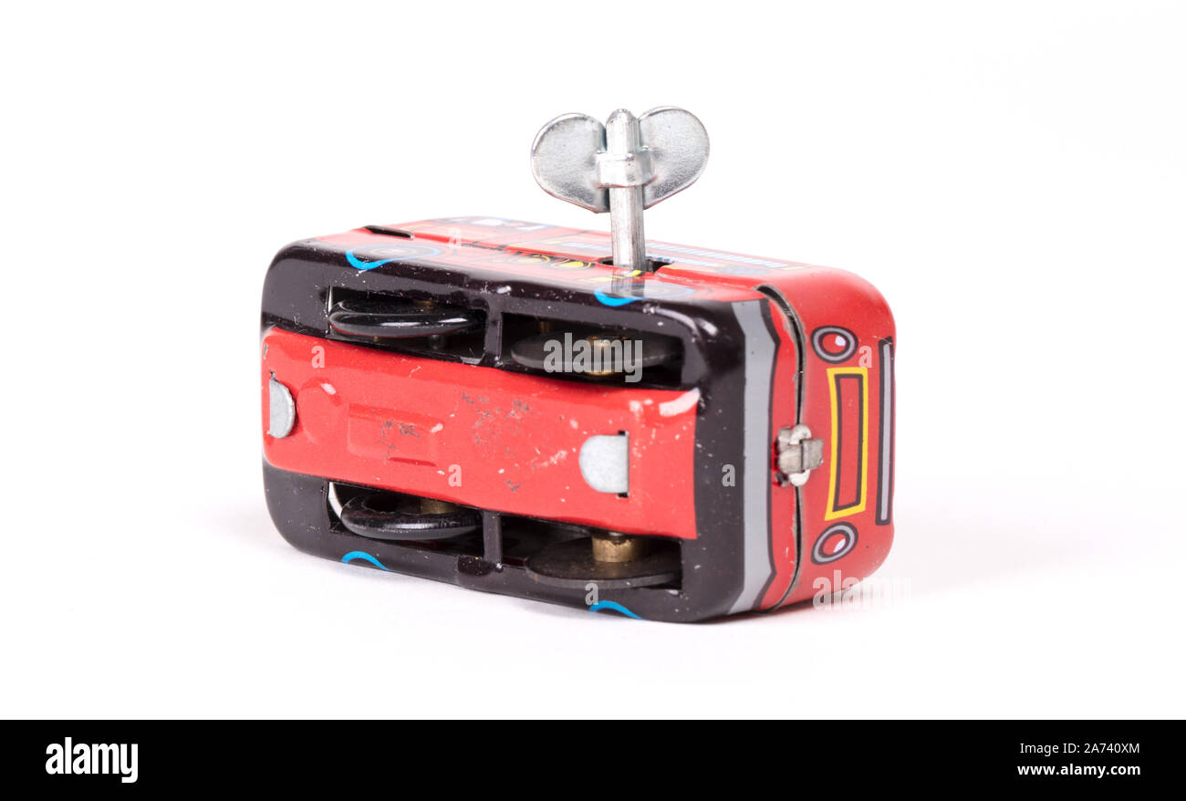 Vintage red wind-up toy car, isolated on white Stock Photo - Alamy