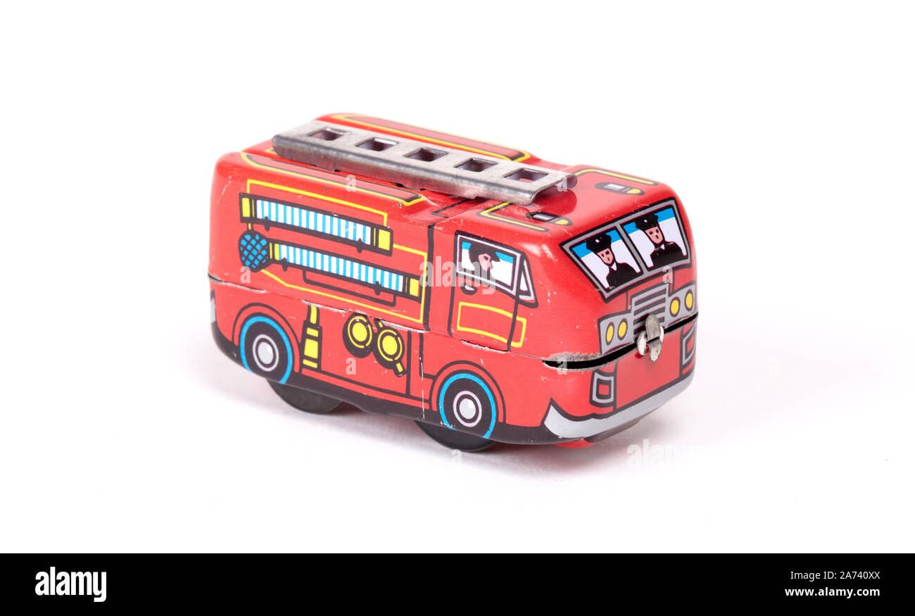 Vintage red wind-up toy car, isolated on white Stock Photo - Alamy