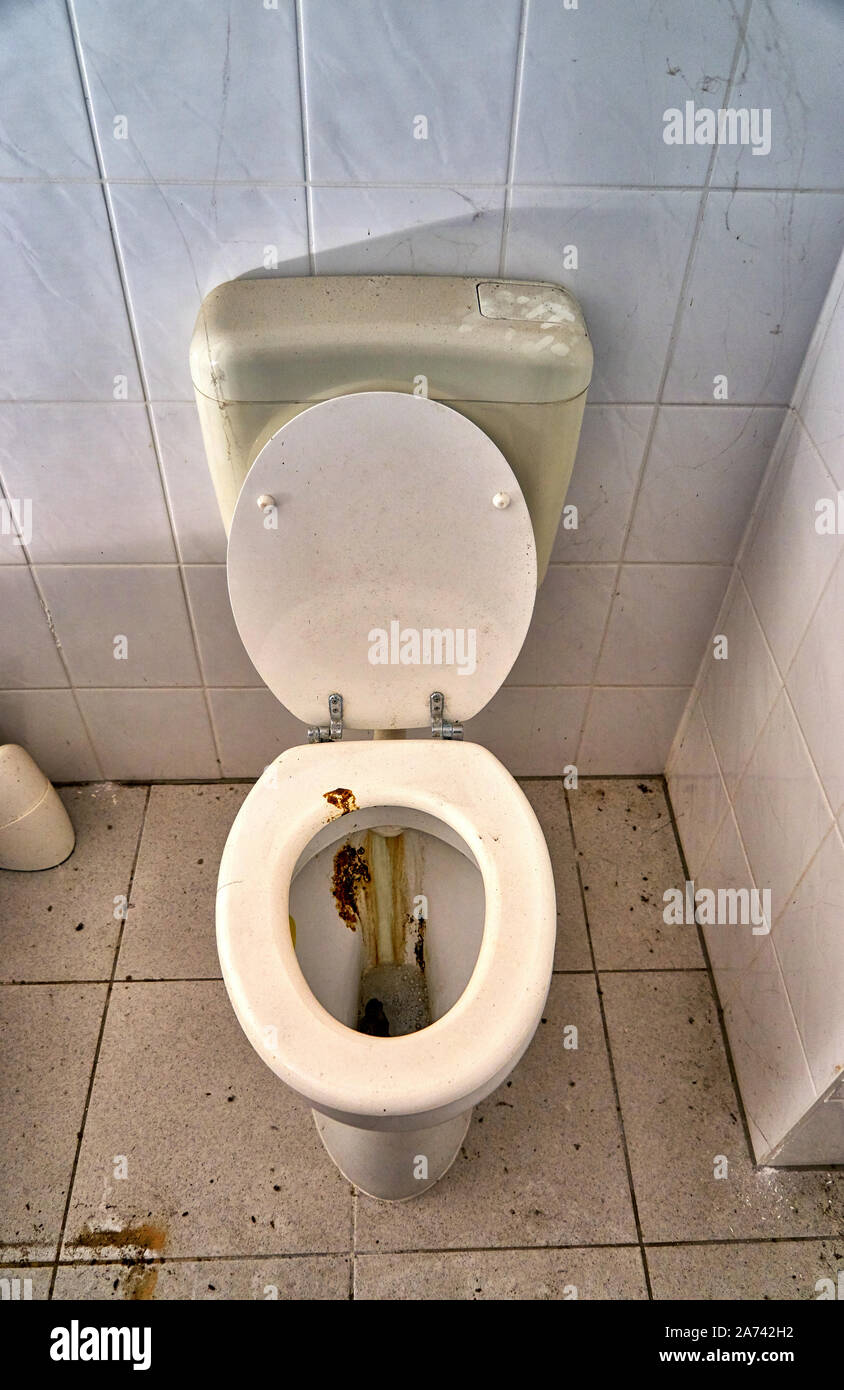 Toilet with feces and urine stained in a dirty bathroom Stock Photo - Alamy