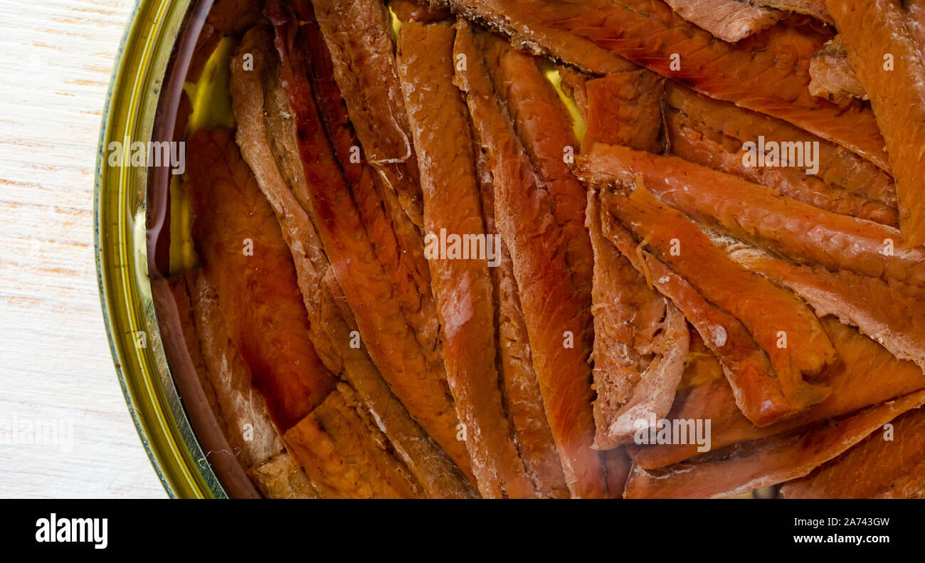 Closeup view of traditional Spanish tinned anchovy fillets in oil Stock ...