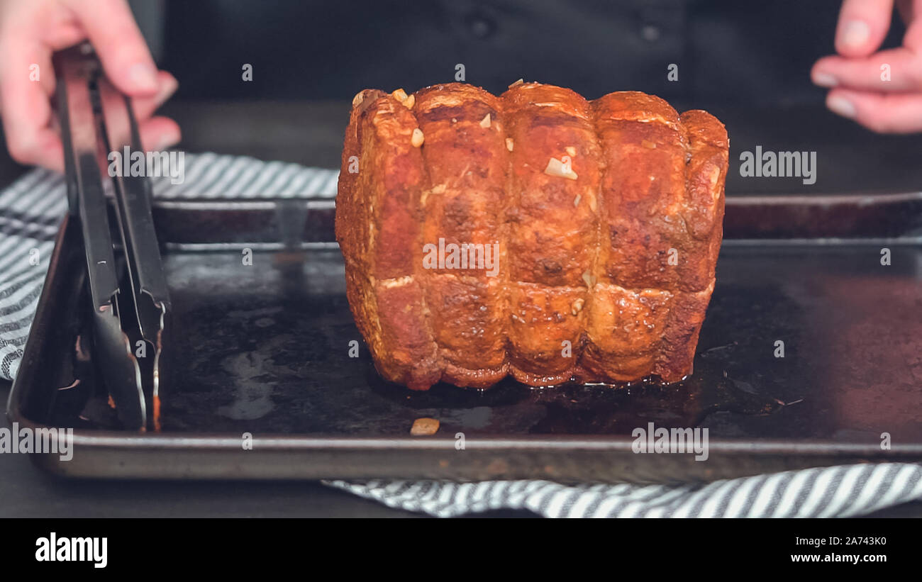 Step by step. Cooked boneless pork roast rubbed with spice rub Stock ...