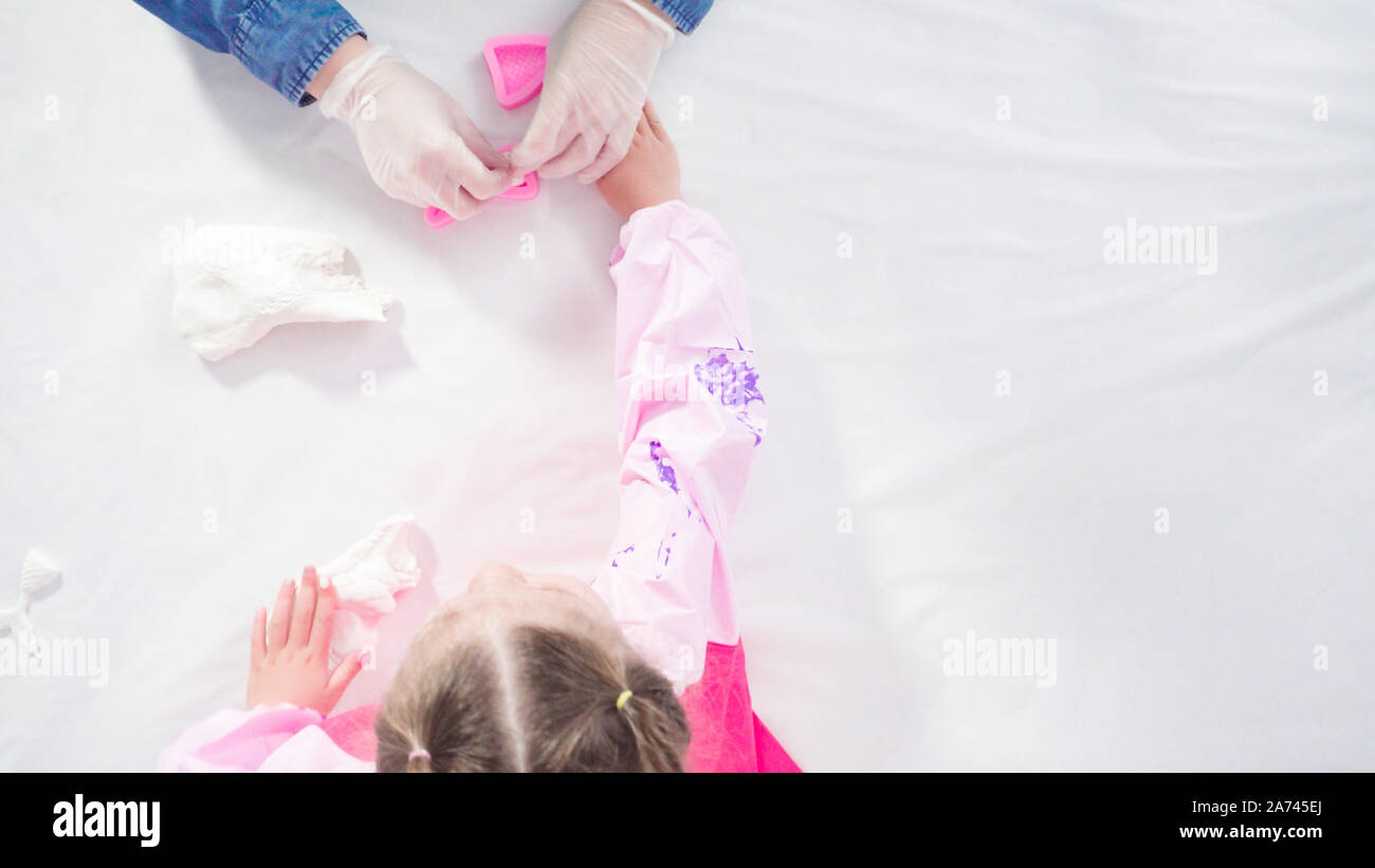 Flat lay. Step by step. Making mermaid tail from modeling clay in ...