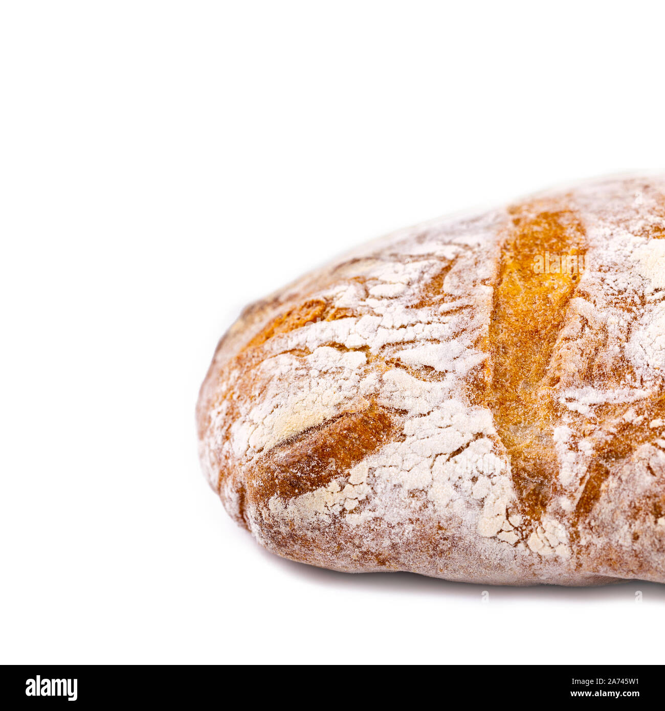 Brown bread top view texture floured. Loaf photo Stock Photo - Alamy