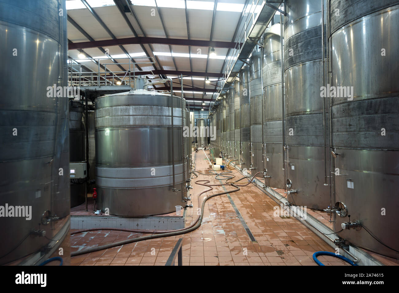 equipment of contemporary winery with stell barrels Stock Photo - Alamy