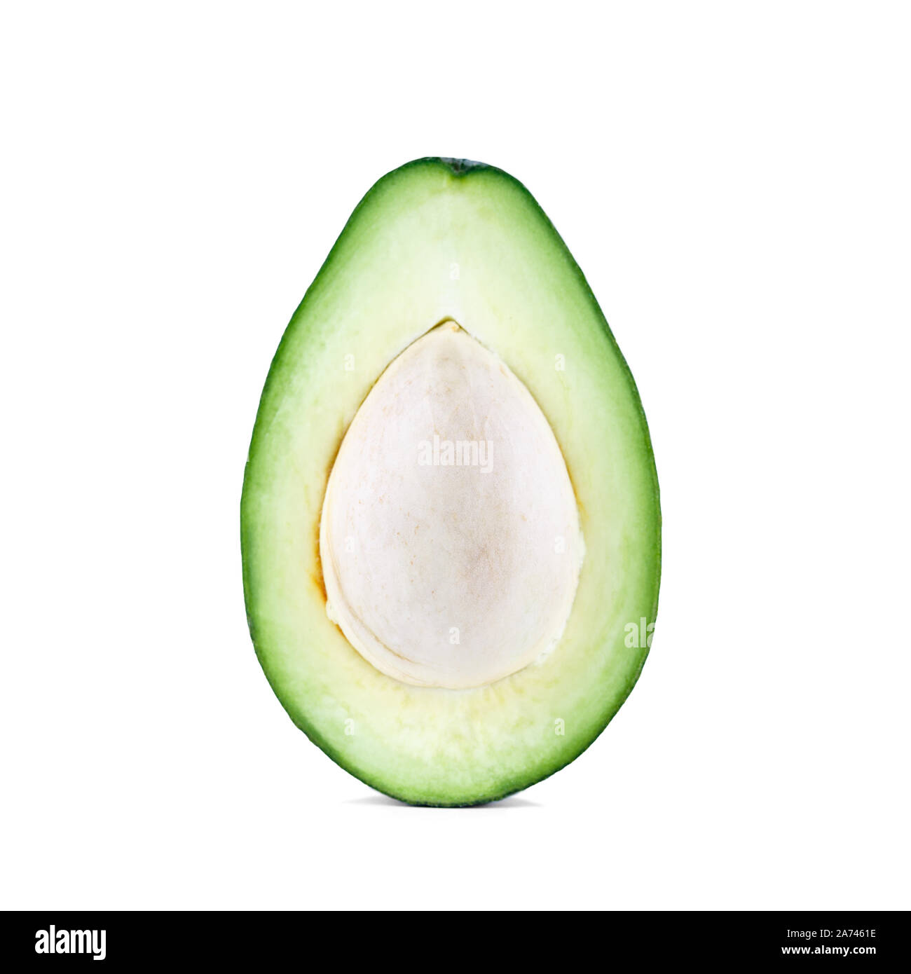Half cut green ripe one avocado with seed isolated on white background ...