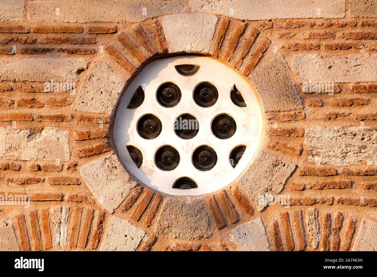 Close-up of an unusual element of a small round stained glass window of ...