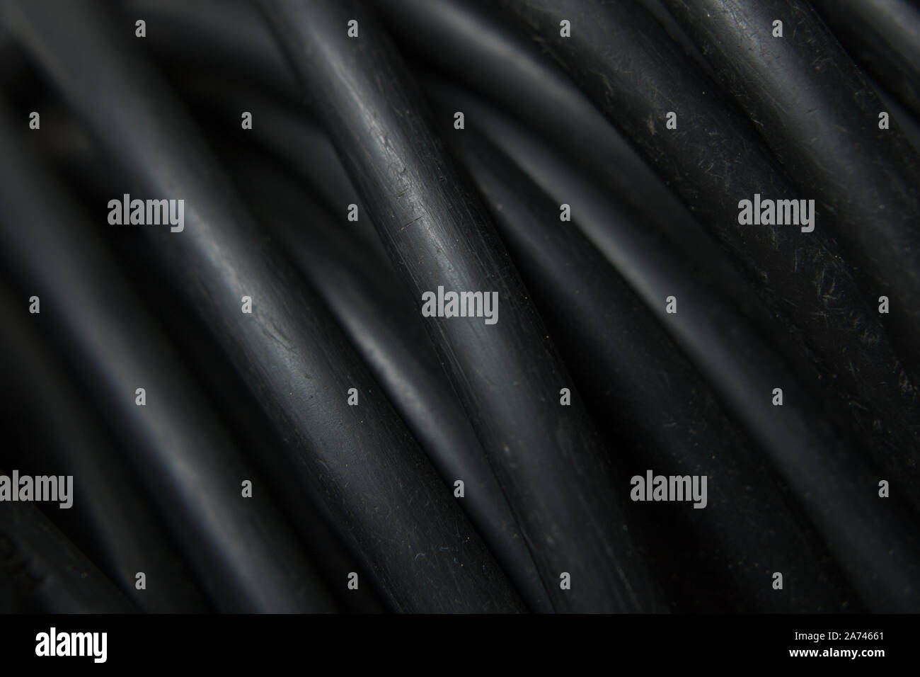Abstract macro photography of black rubber cables Stock Photo - Alamy