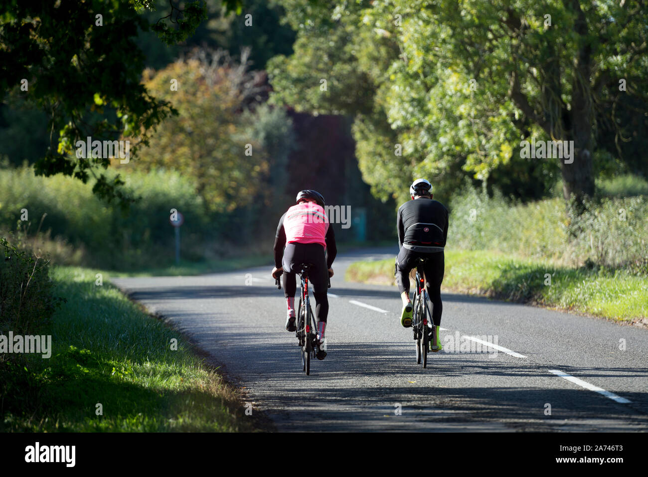 Two men on bikes hi-res stock photography and images - Alamy