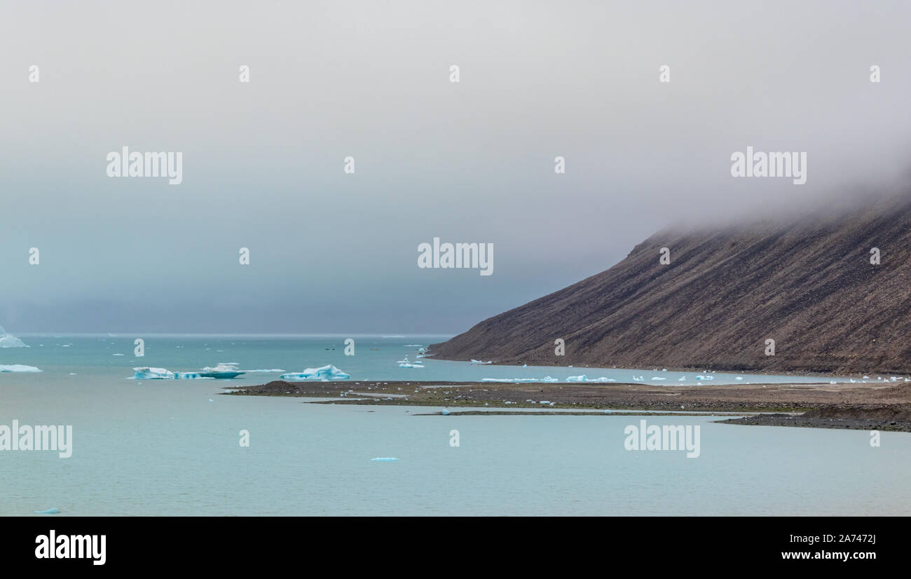 Scenery of icebergs and mountains in Croker Bay, Devon Island, Nunavut ...