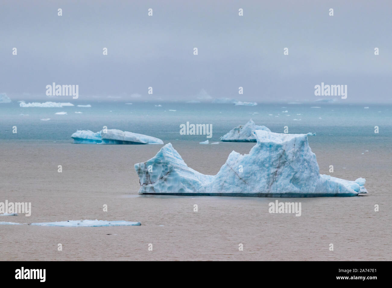 An iceberg floating in Croker Bay, Devon Island, Nunavut, Canada Stock ...