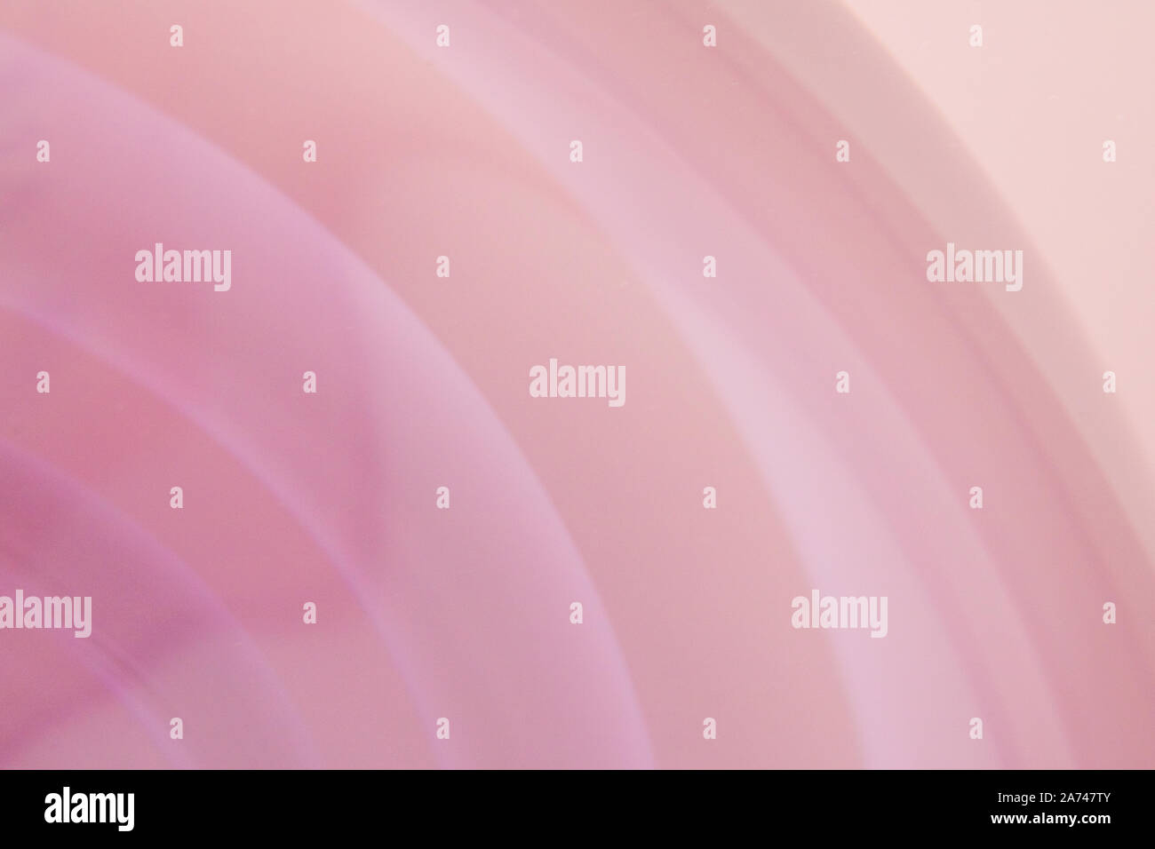 Abstract photography of curves resembling planet surfaces or rings ...