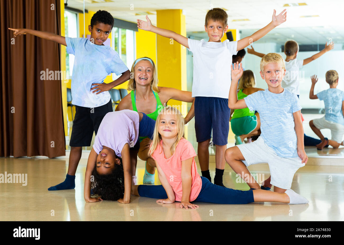 Happy children in dance studio smiling and having fun Stock Photo - Alamy