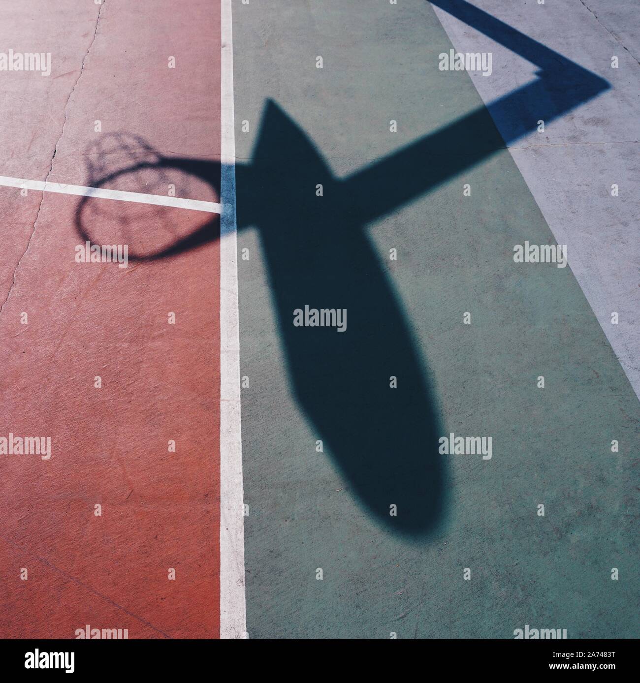 basketball hoop shadow silhouette on the court on the street Stock ...