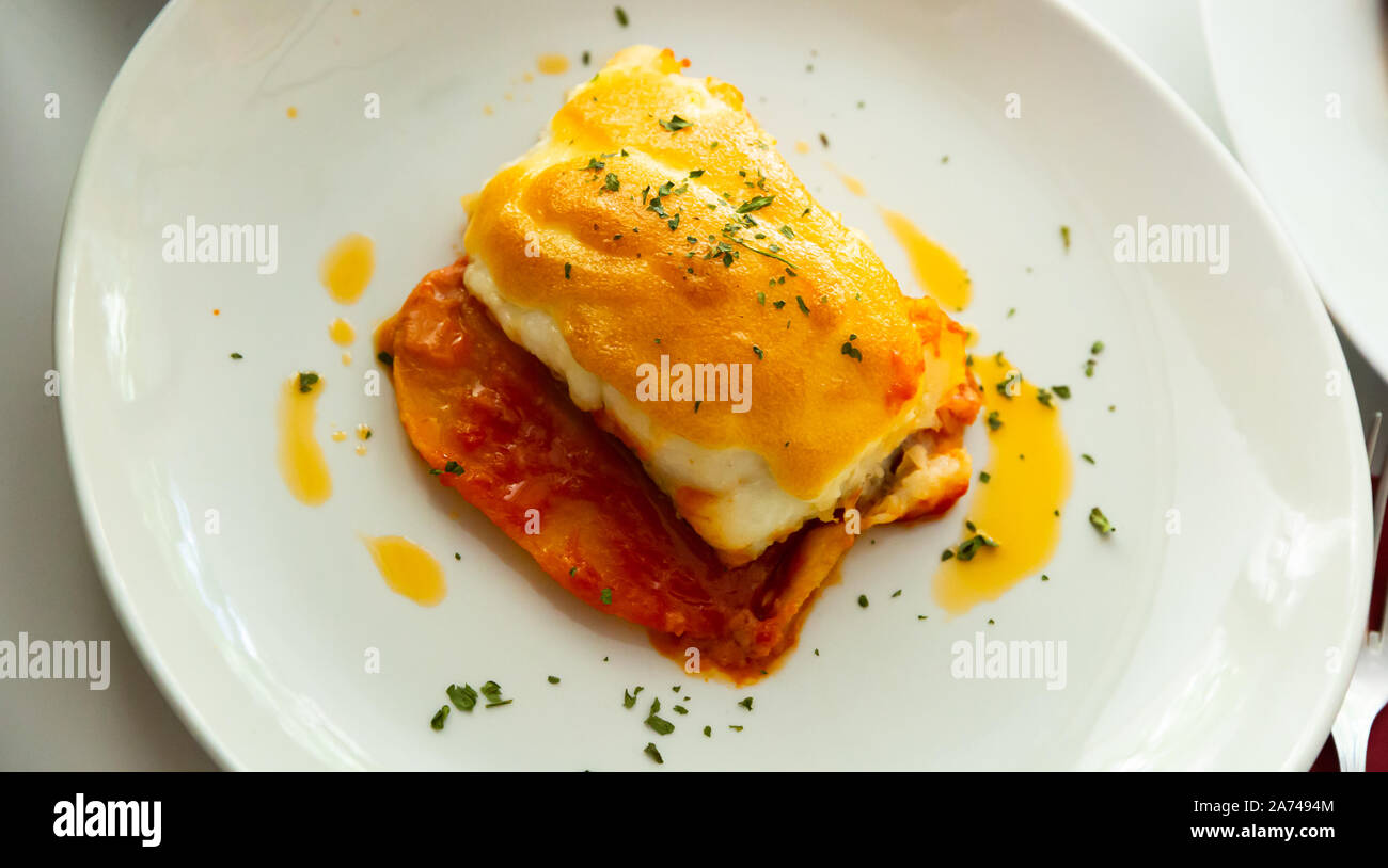Image of hot cod backed with sauces and served at plate, nobody Stock ...