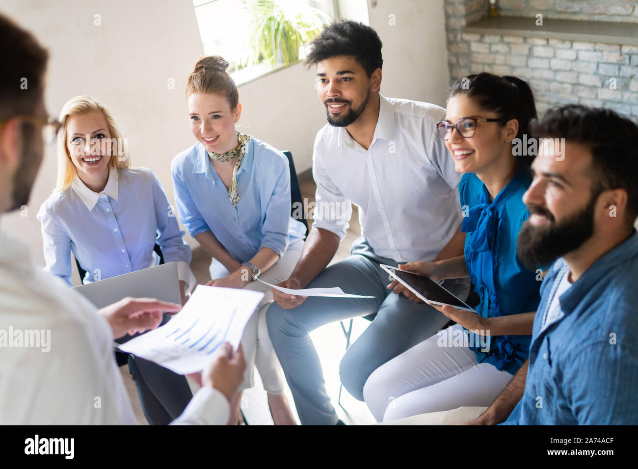 Successful business group working at the office Stock Photo - Alamy