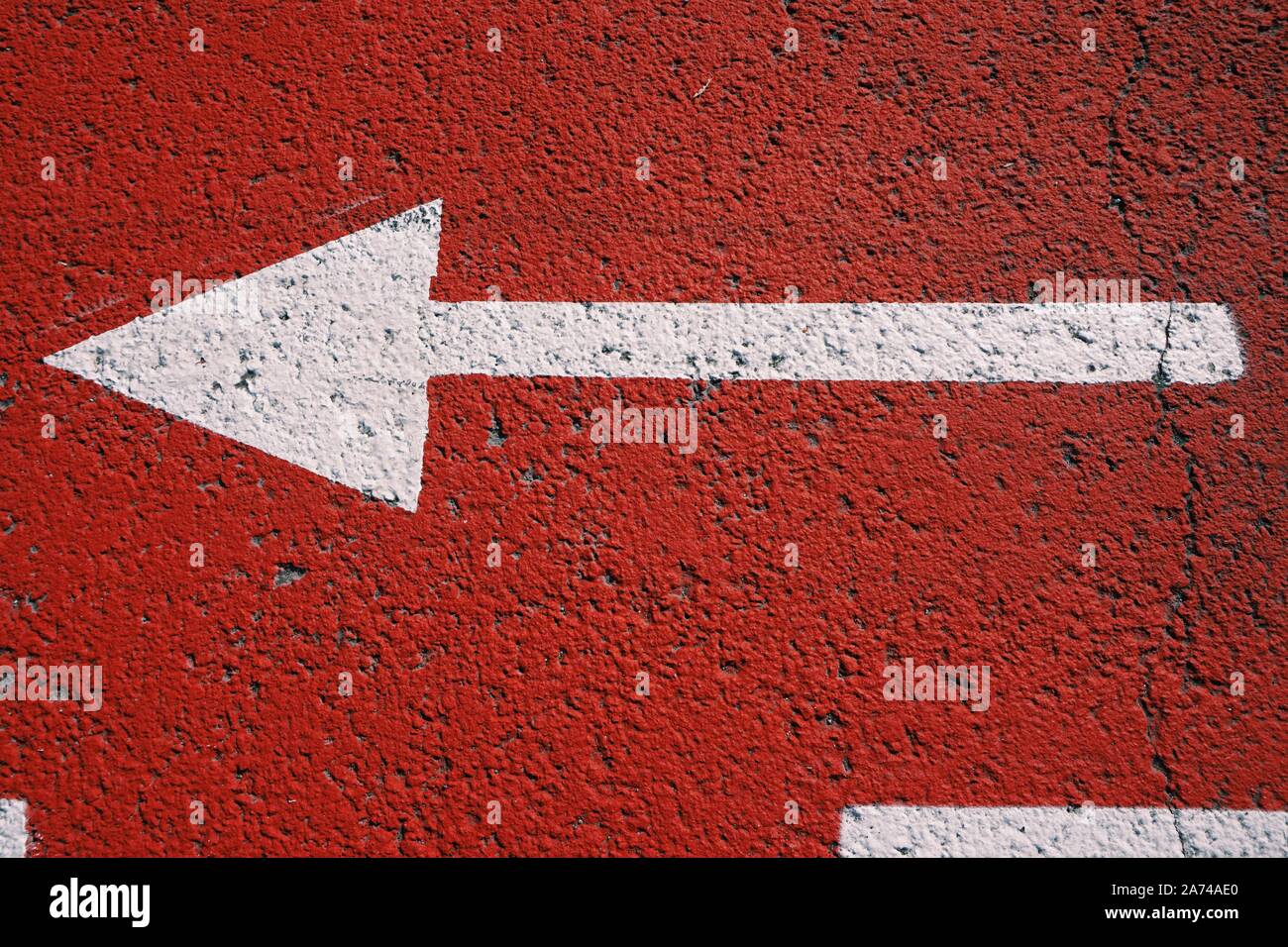 arrow road sign on the road on the street Stock Photo - Alamy
