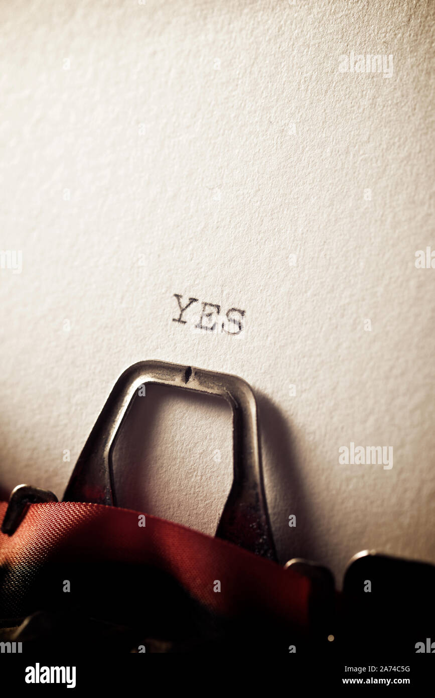 The word, Yes, written with a typewriter Stock Photo - Alamy