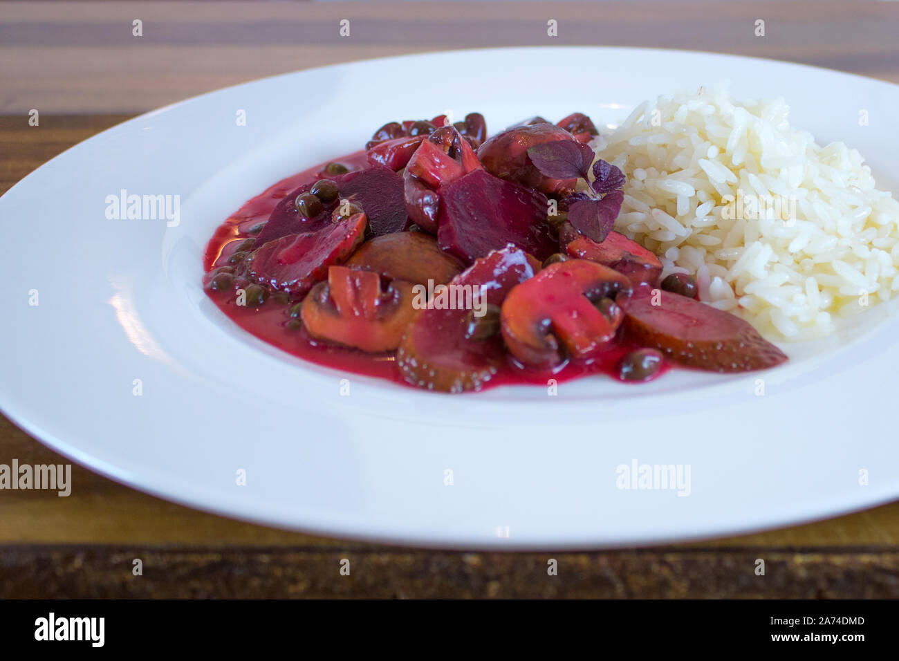 Food photography of a Russian inspired dish with beets and rice in a ...