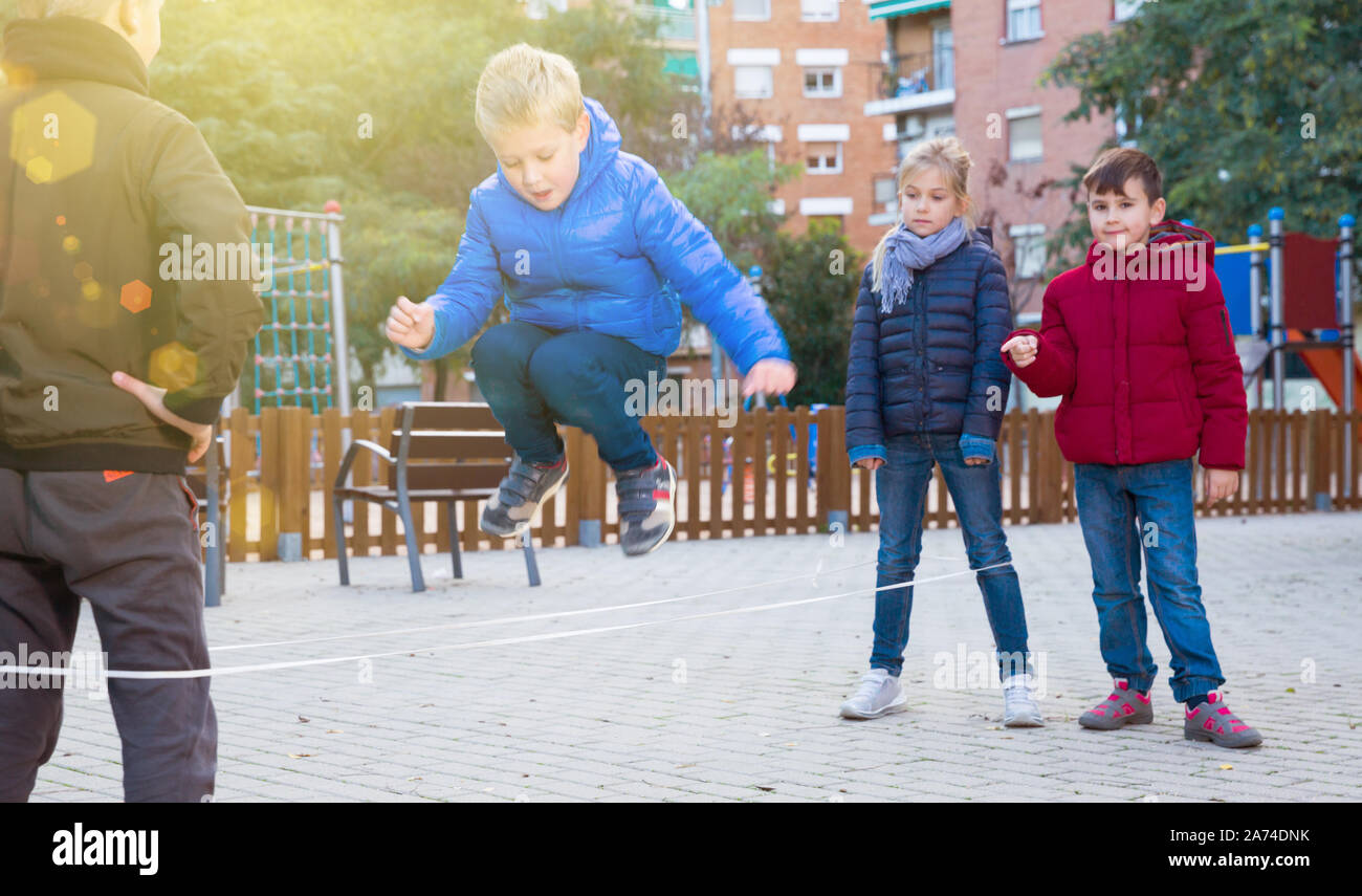 Kids jumping rope playground hi-res stock photography and images - Alamy