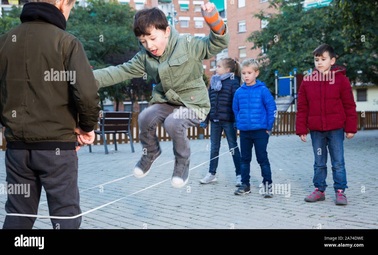 Kids jumping rope playground hi-res stock photography and images - Alamy