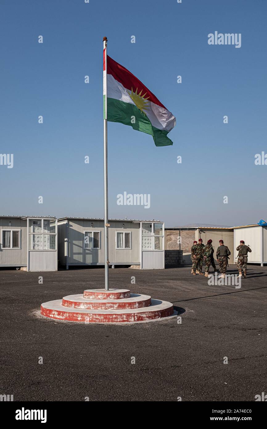 Peshmerga soldiers in the yard of the headquarter of the autonomous ...