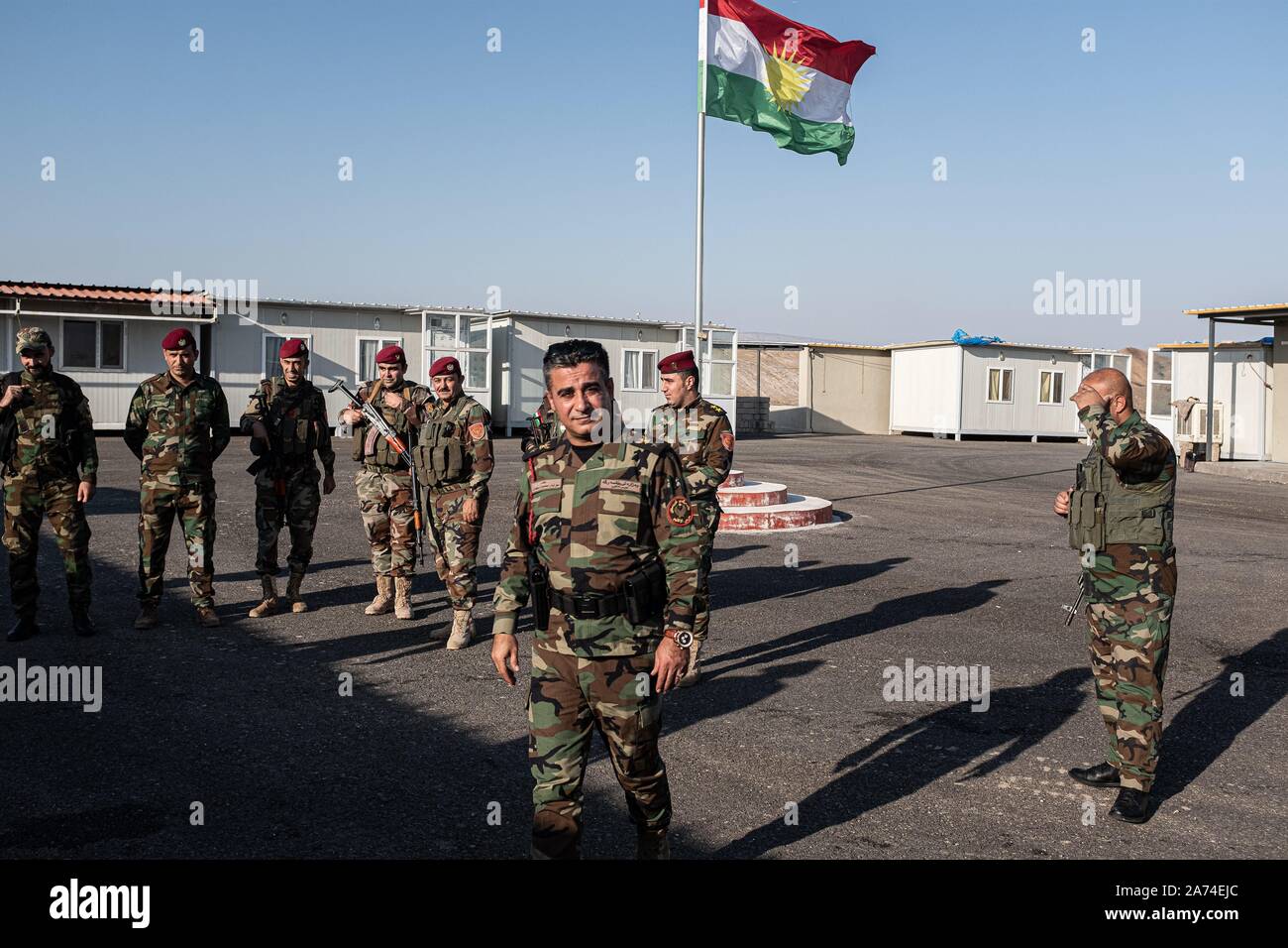Peshmerga soldiers in the yard of the headquarter of the autonomous ...