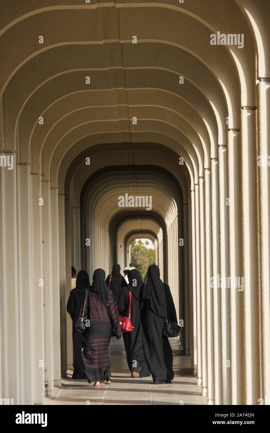 Muscat, Oman Women in the hallways of the Sultan Qaboos University ...