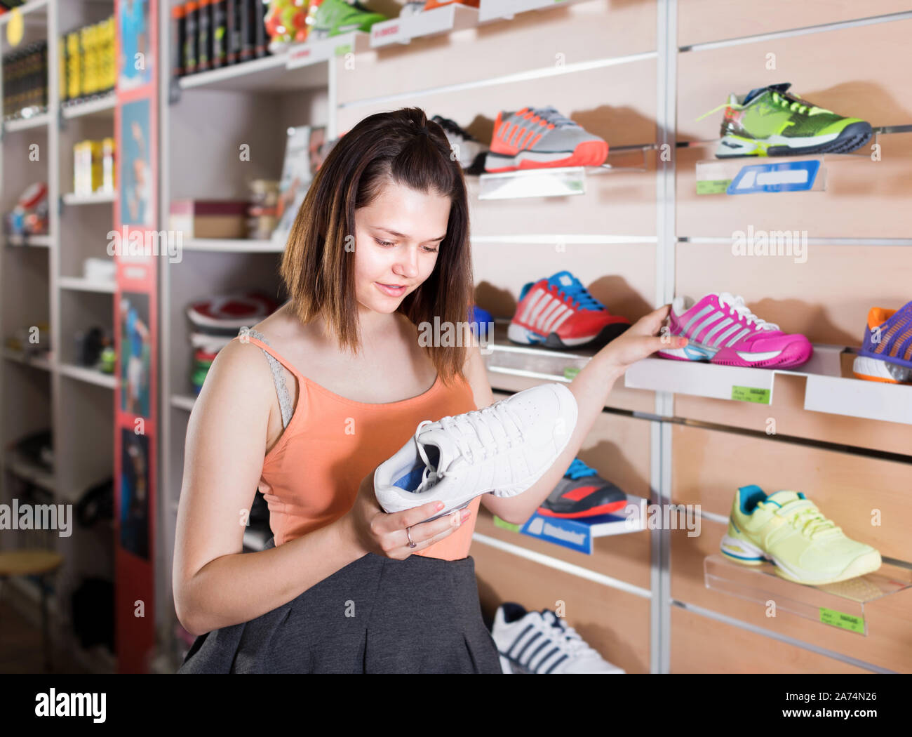 Teen girl choosing shoes hi-res stock photography and images - Alamy