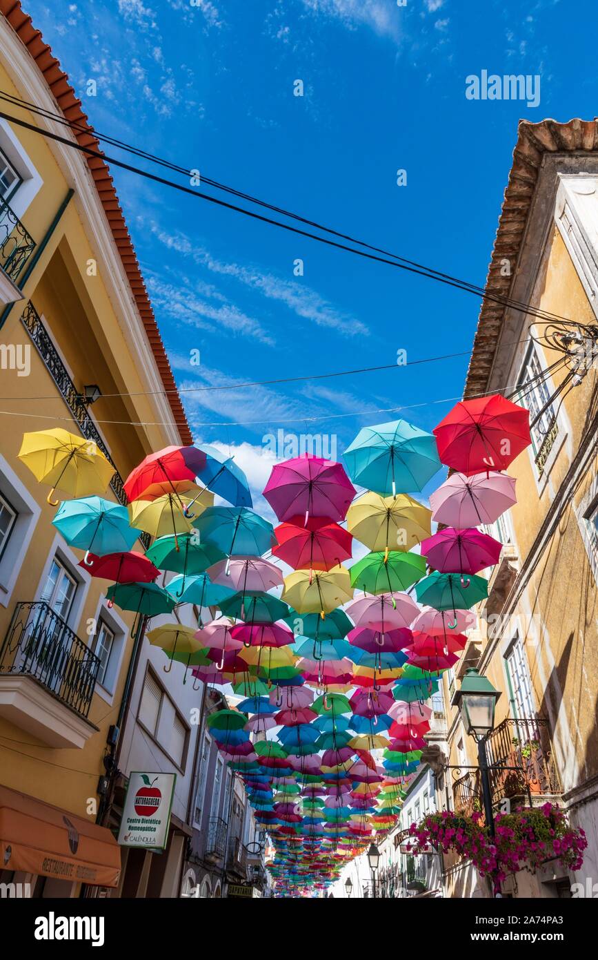 Colorful umbrellas hung over the streets of Agueda, Portugal Stock ...
