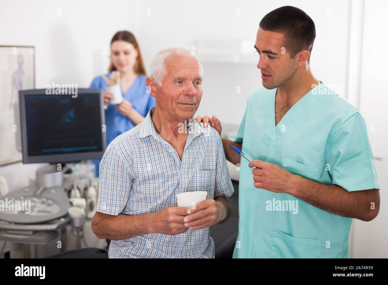 Professional sonographer explaining future ultrasound diagnostic ...