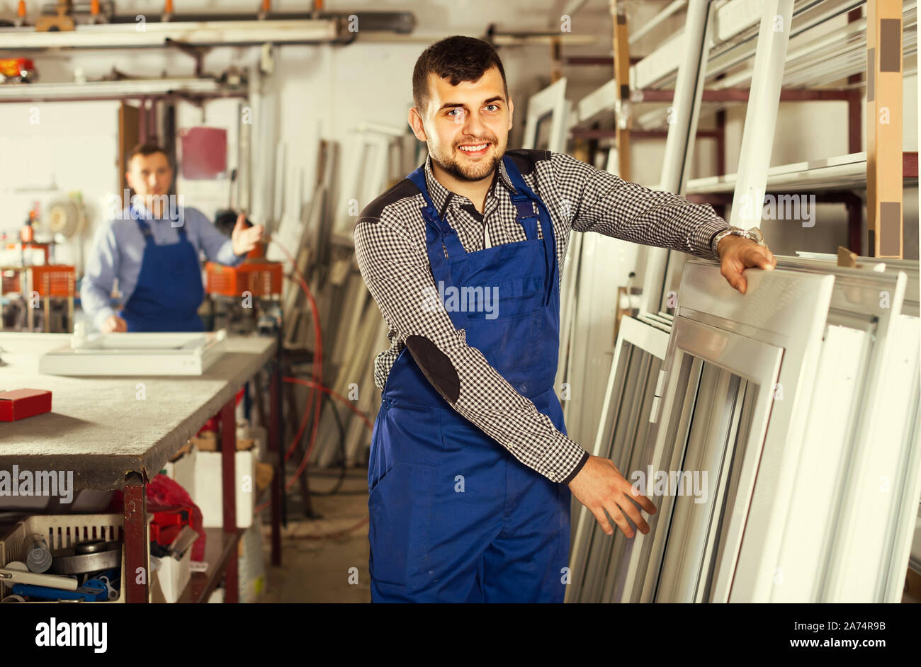 Production adult spanish workers in coverall with different finished ...
