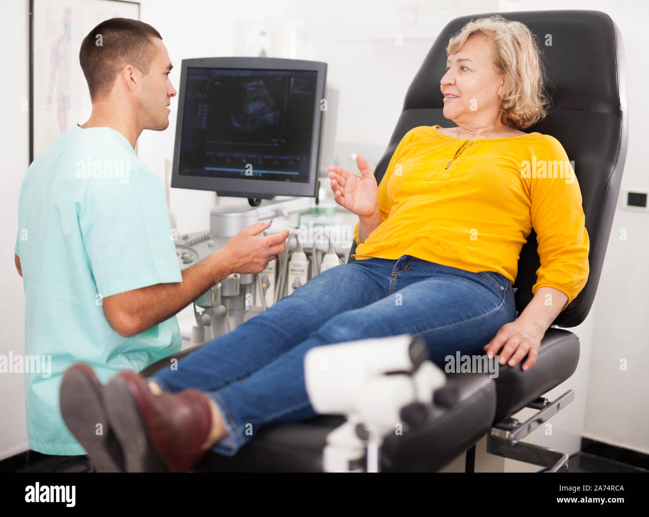 Professional sonographer explaining future ultrasound diagnostic ...