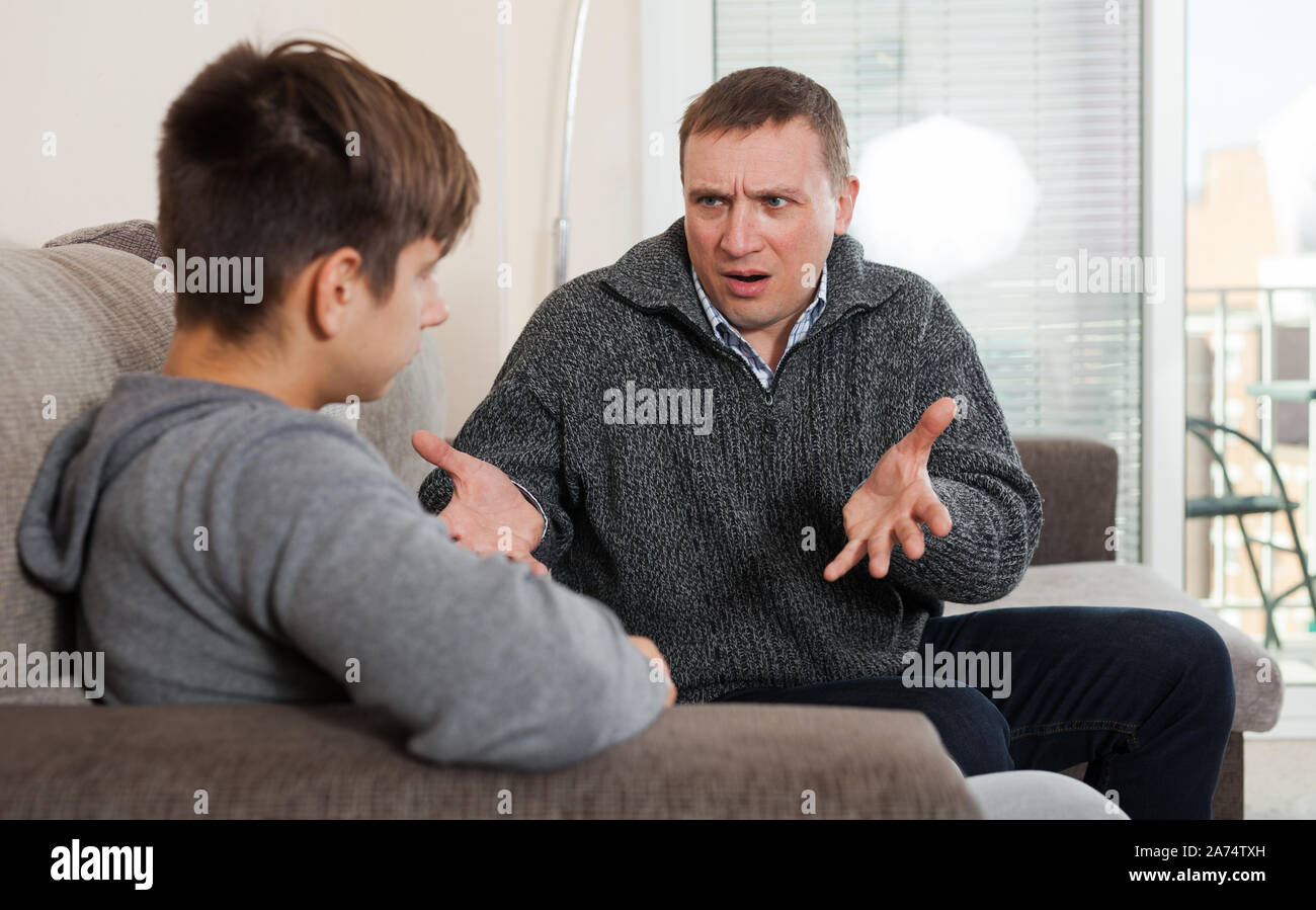 Father scolds son hi-res stock photography and images - Alamy