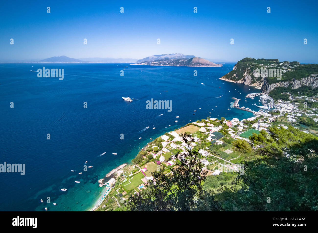 Wide panoramic view of Capri Marina Grande, Gulf of Naples and Sorrento ...