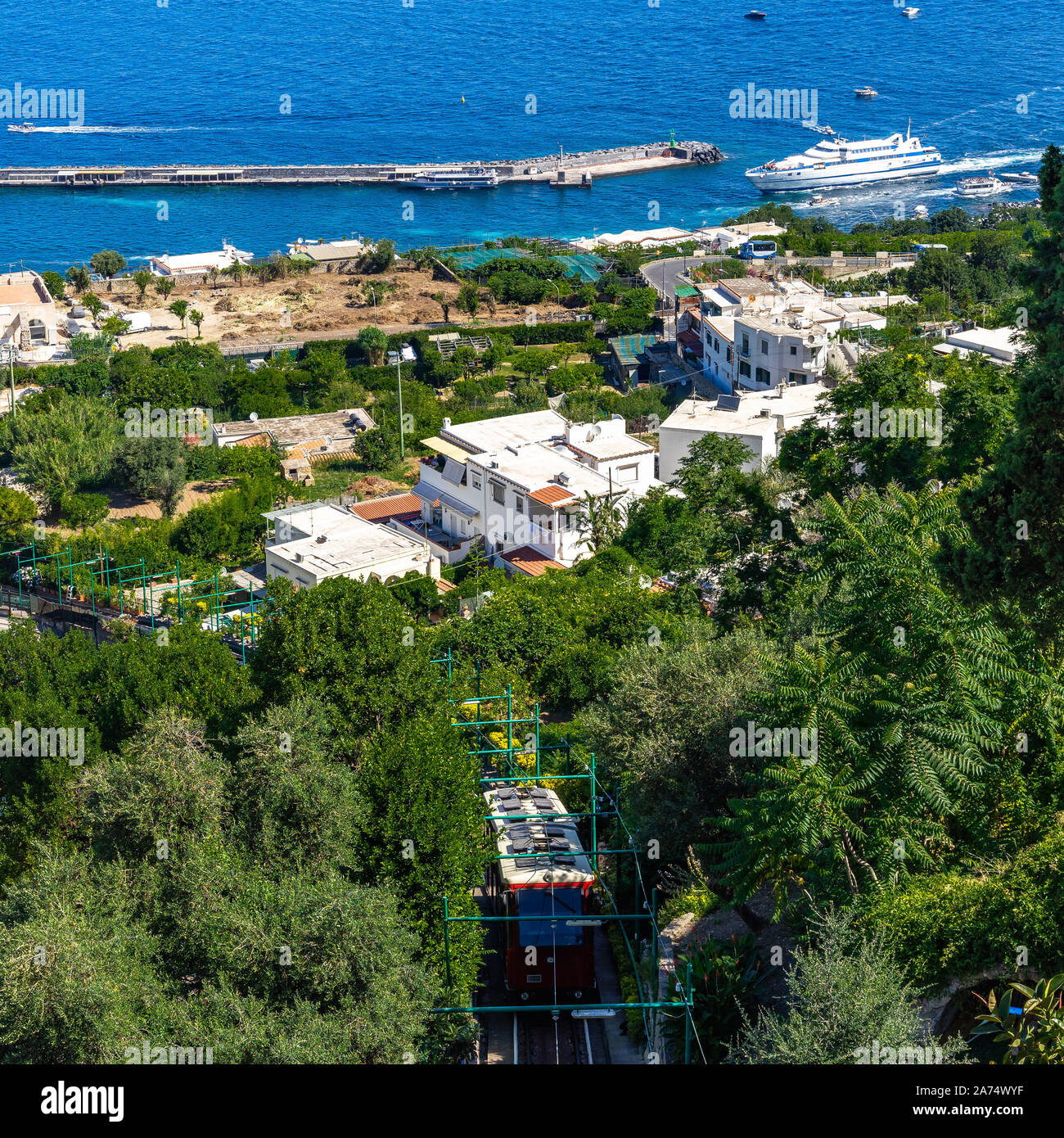 Funicular train riding up from Marina Grande to Capri town, Campania ...