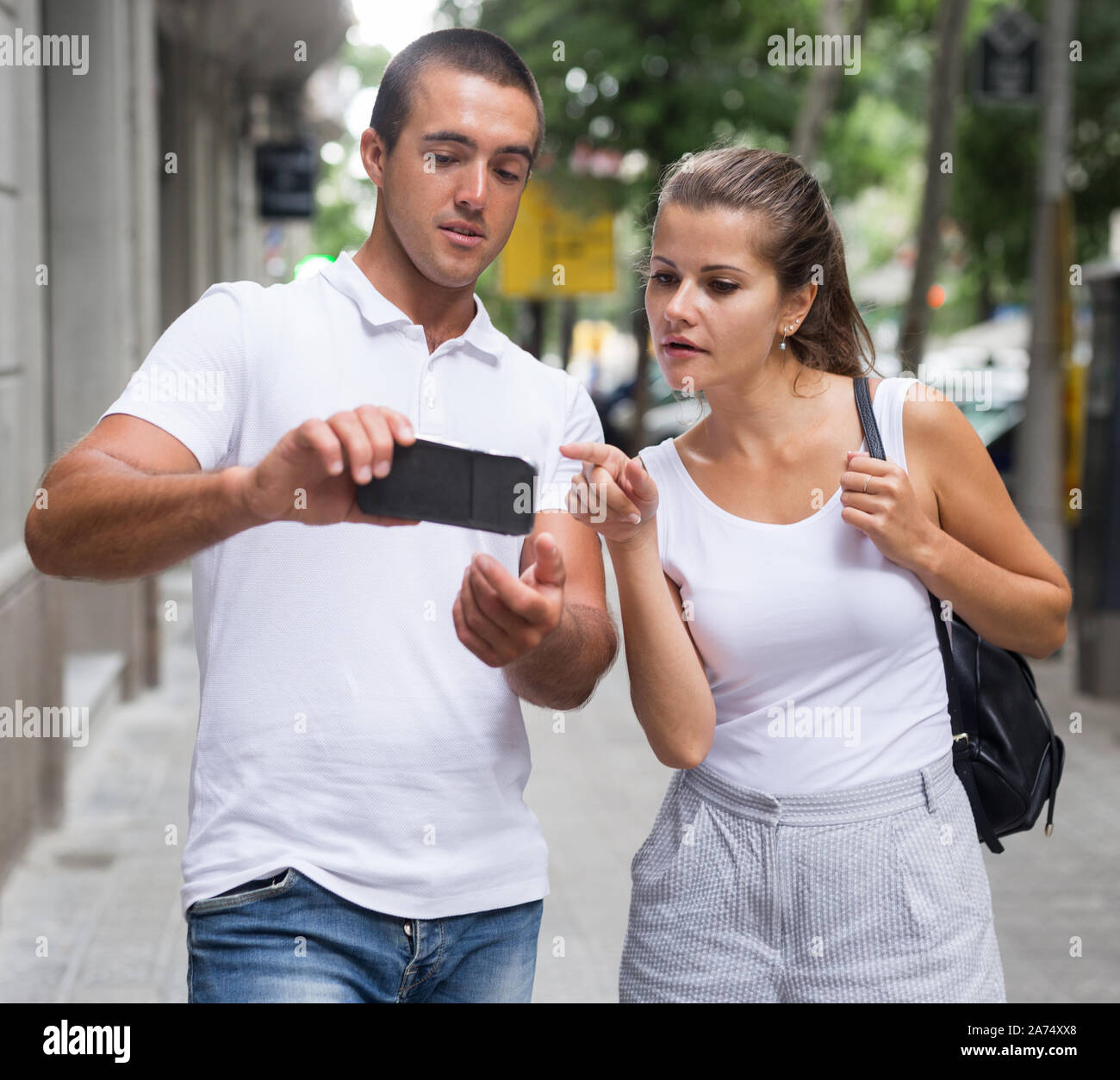 Helping people find their way hi-res stock photography and images - Alamy