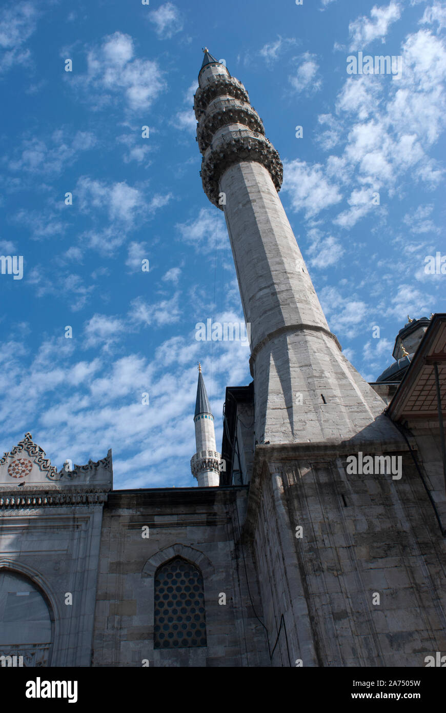 The view of mosque minarets with a blue sky in a background in Istanbul ...