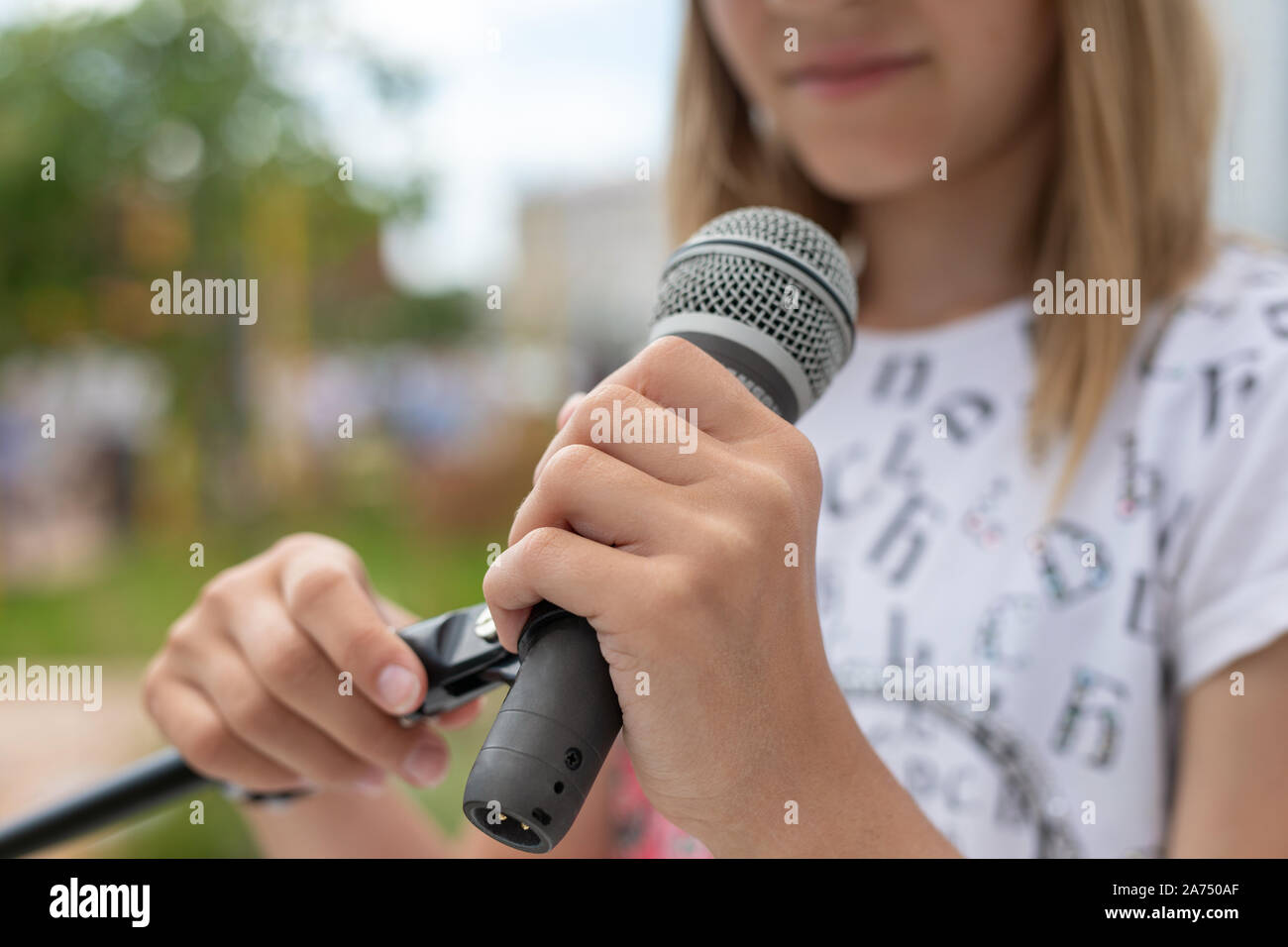Holding Mic With Both Hands High Resolution Stock Photography and ...