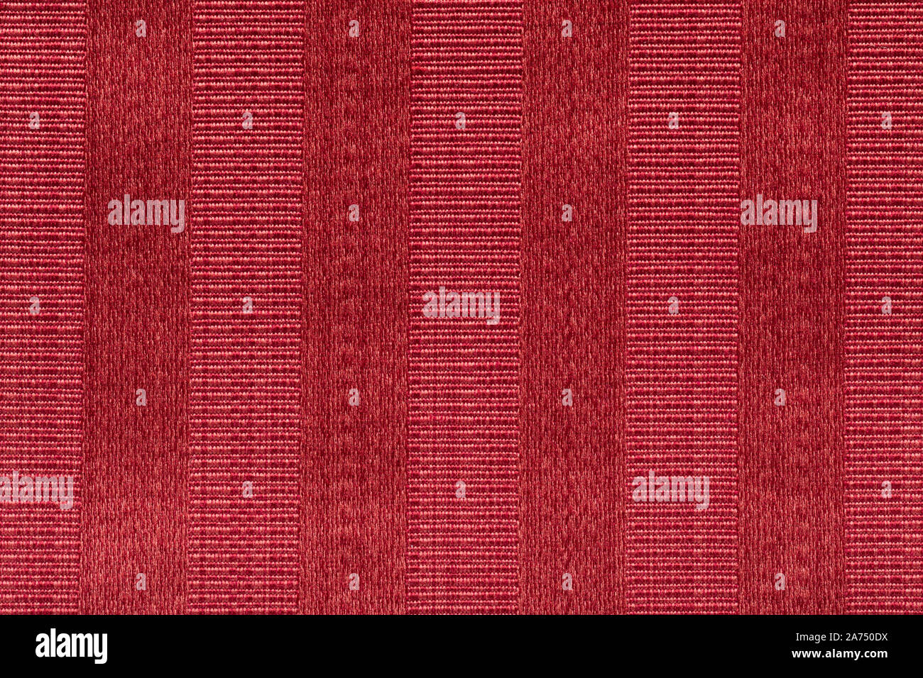 Fabric striped background. Red fiber texture polyester close-up. a fine ...
