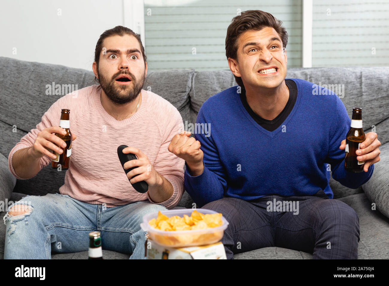 Two guys drinking beer on hi-res stock photography and images - Alamy