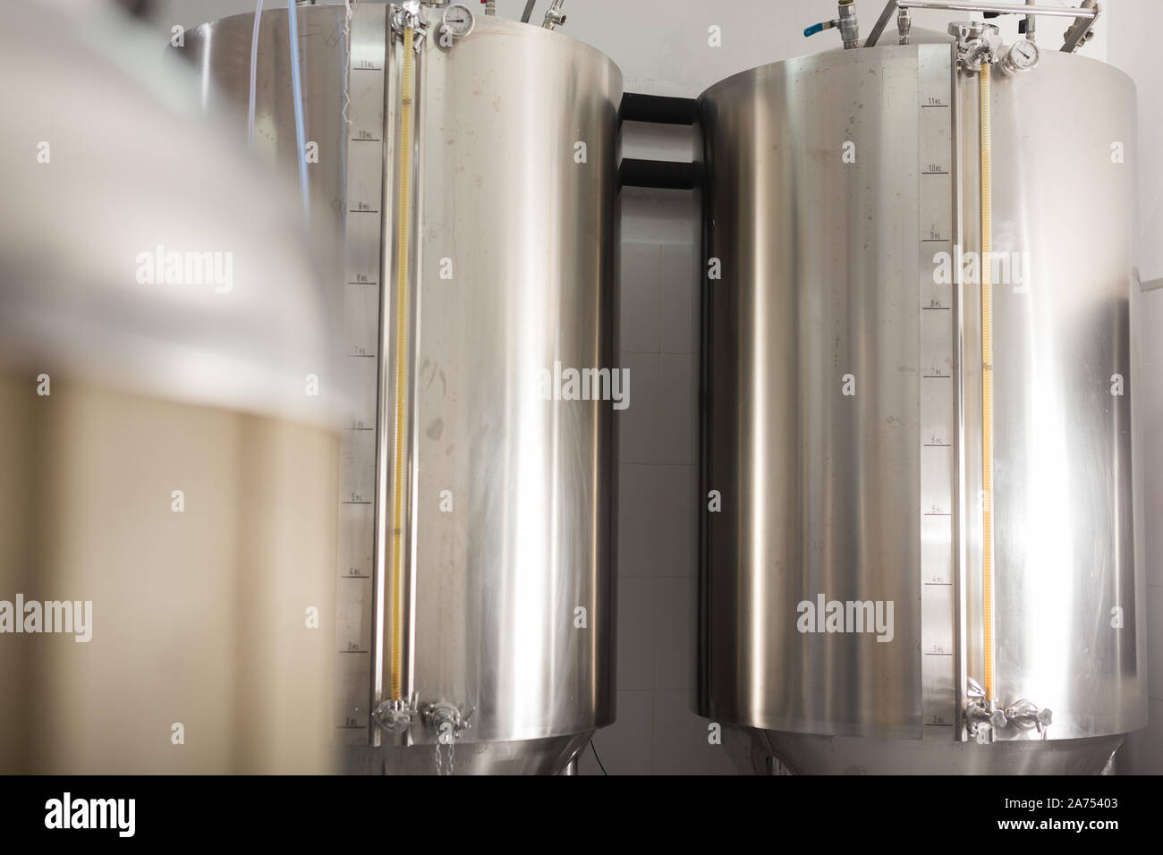 Tanks for the storage and fermentation of beer in modern beer factory ...