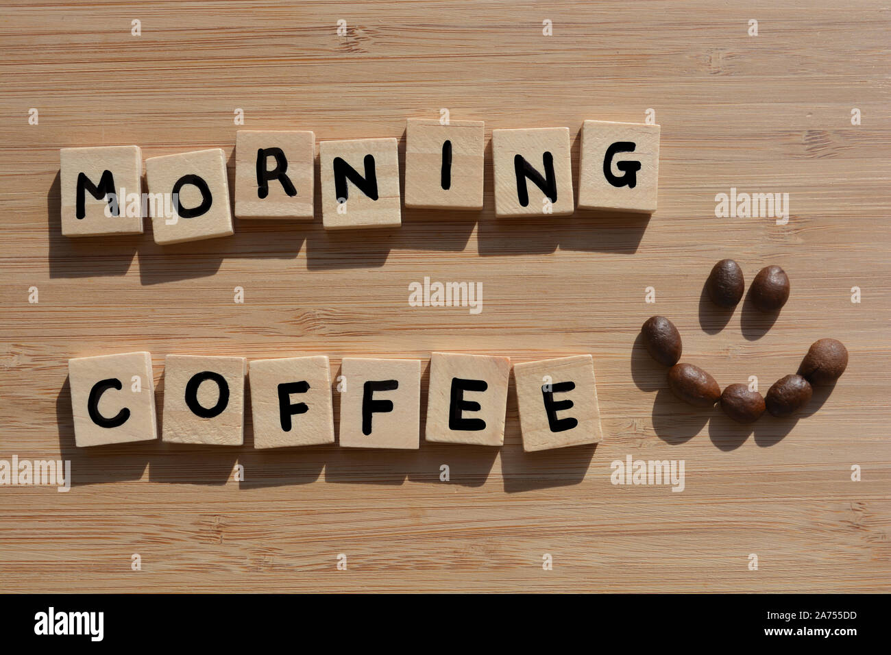 Morning Coffee. Words in 3d wooden alphabet letters with coffee beans ...
