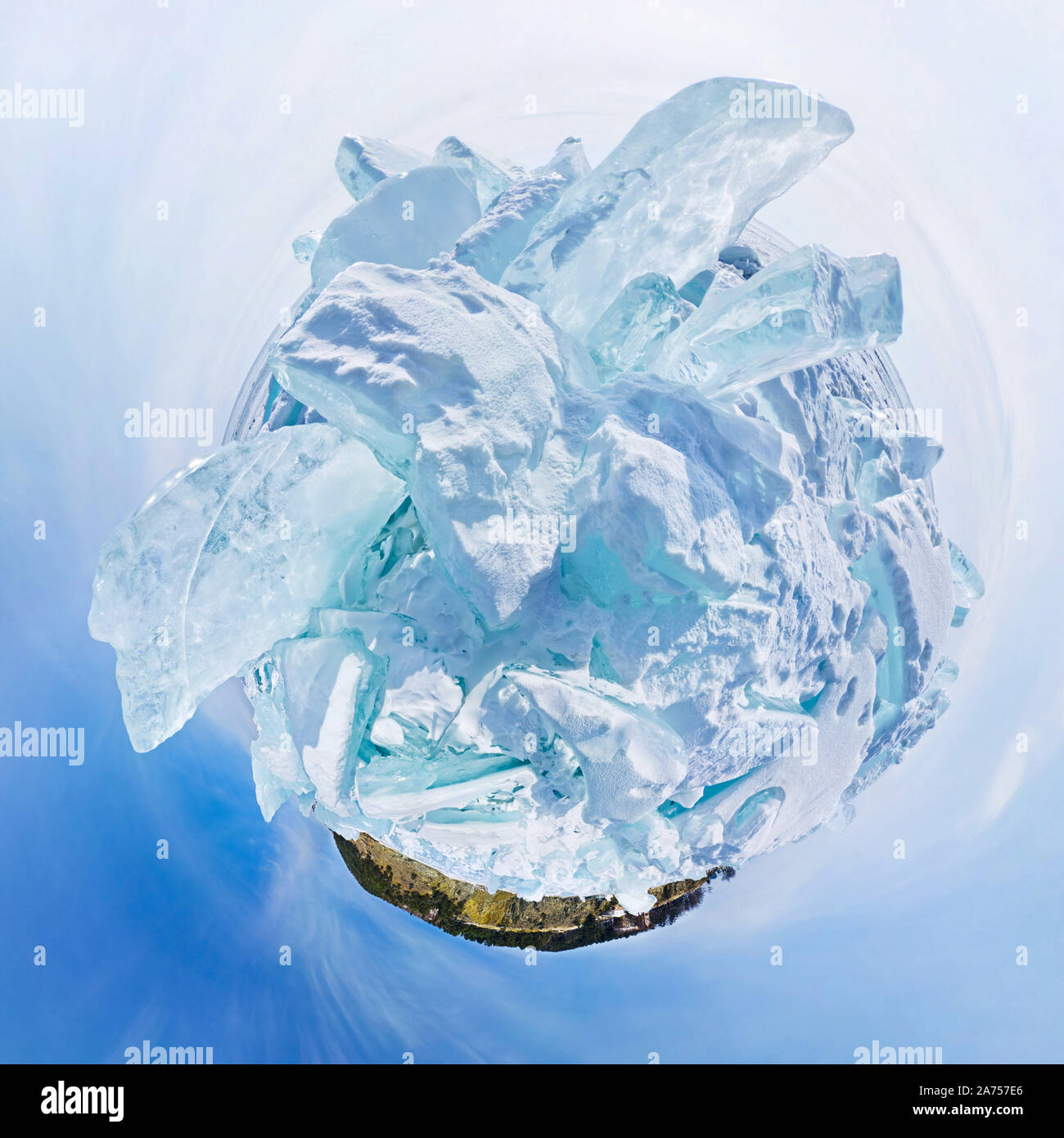 Blue ice hummocks sphere covered with cracks on a blue background. Tiny ...