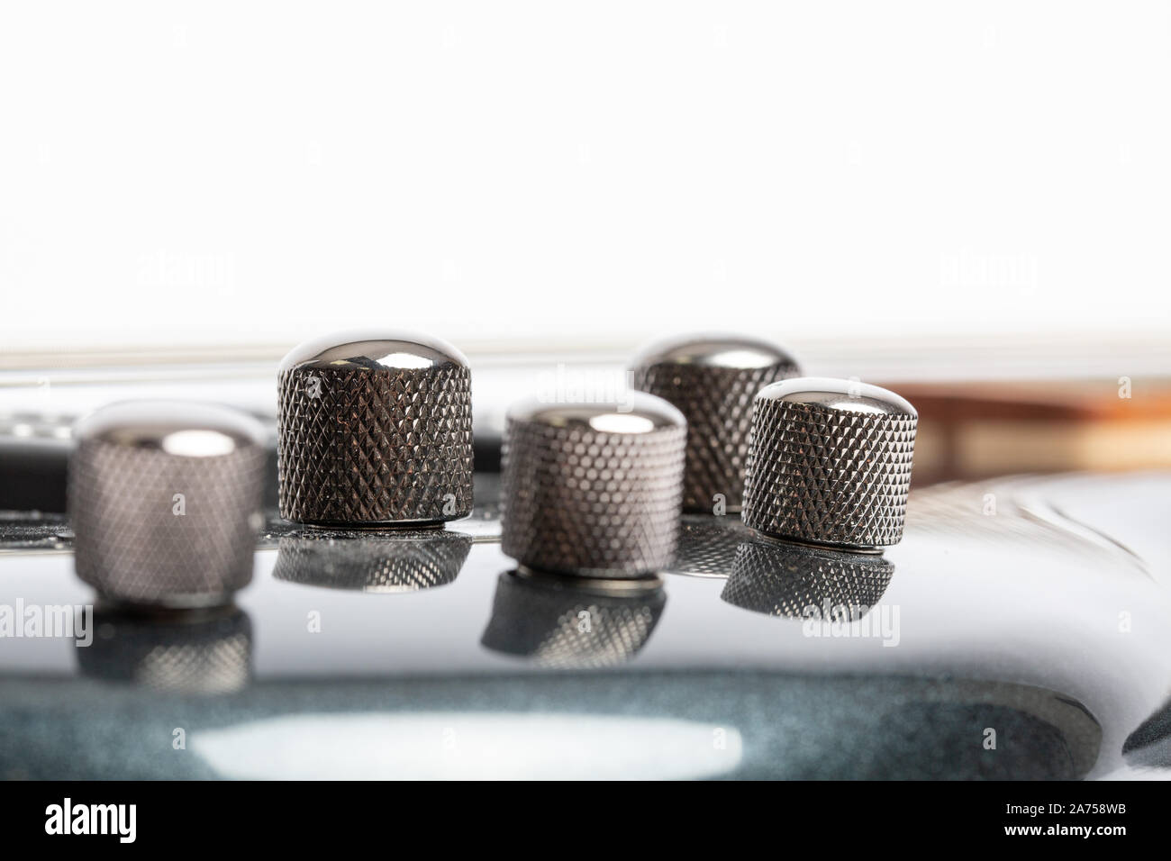 Volume and Tone controls on a modern bass guitar Stock Photo - Alamy