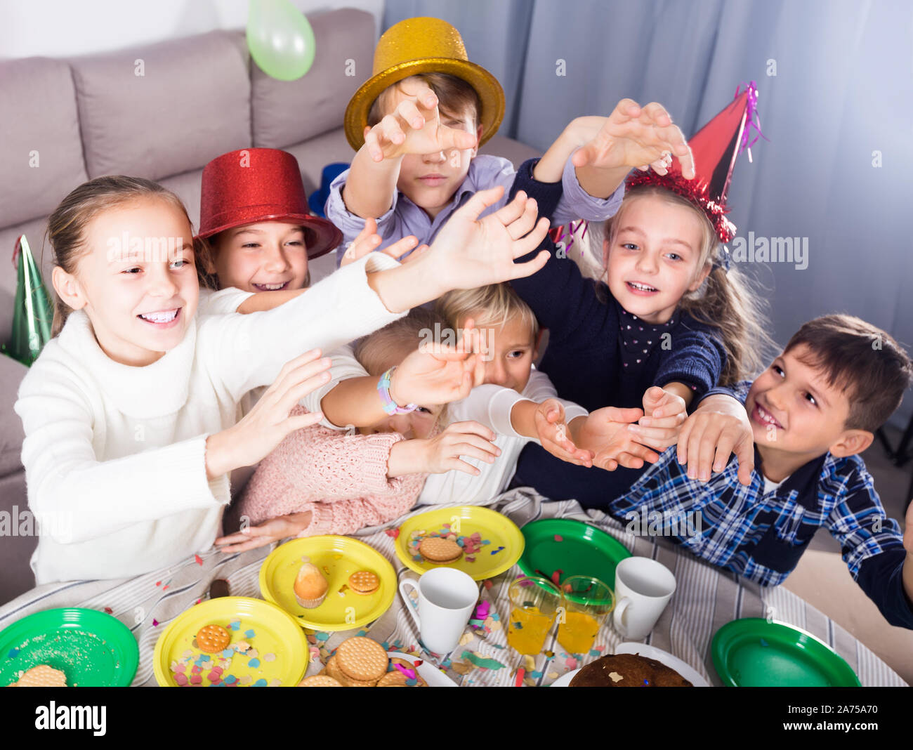 active kids having good time during friend’s birthday party Stock Photo ...